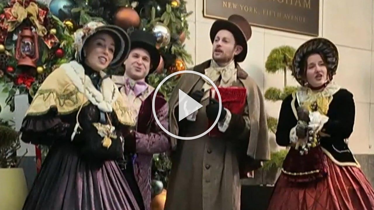 Carolers bring Christmas past to life for families