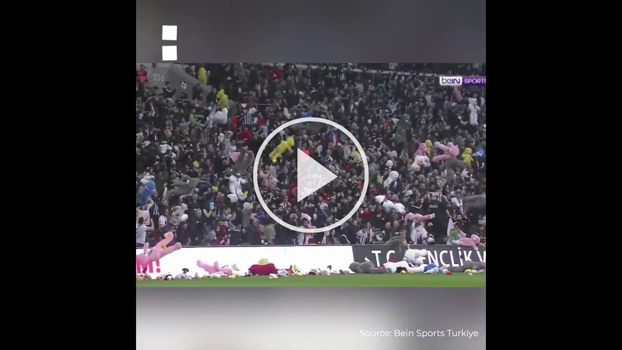 Football fans throw toys on pitch for victims of Turkey quake