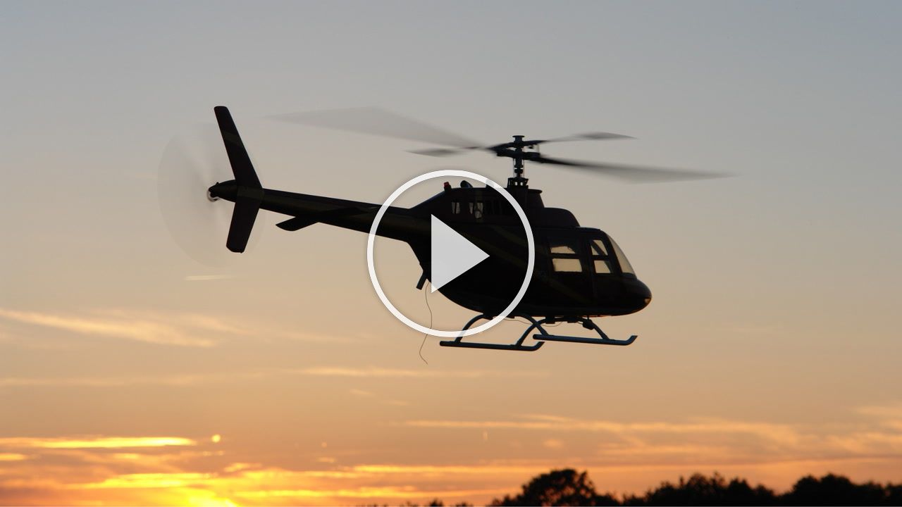 Woman says she held pilot's hand after helicopter crash